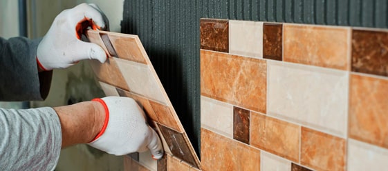 Servicio Instalación de enchapes. CONSTRUCCIONES CHAMPIONS.